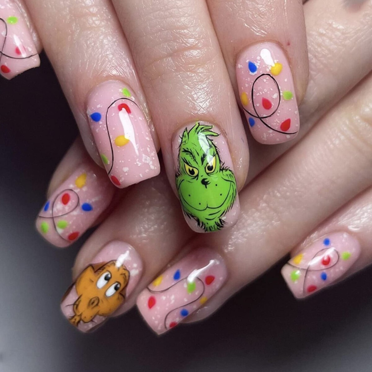 Festive Grinch Nail Designs For The Holidays